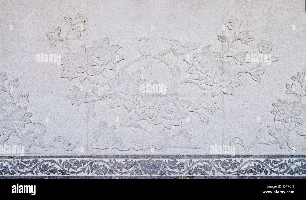 Craved granite rock sculpture for wall decoration Stock Photo - Alamy