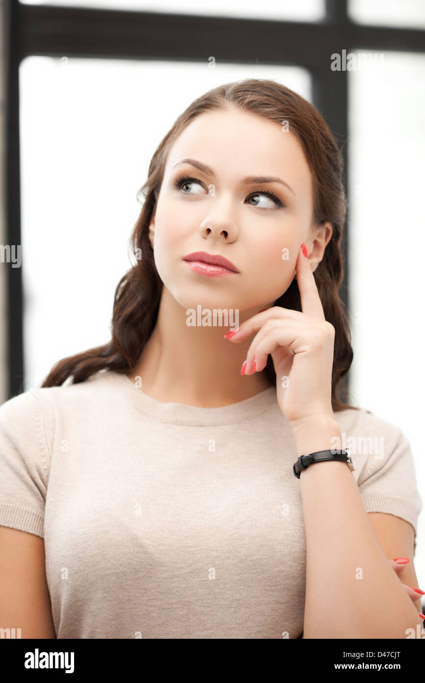 calm and serious thinking woman Stock Photo - Alamy