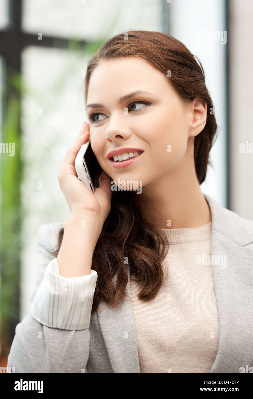 businesswoman with cell phone calling Stock Photo - Alamy