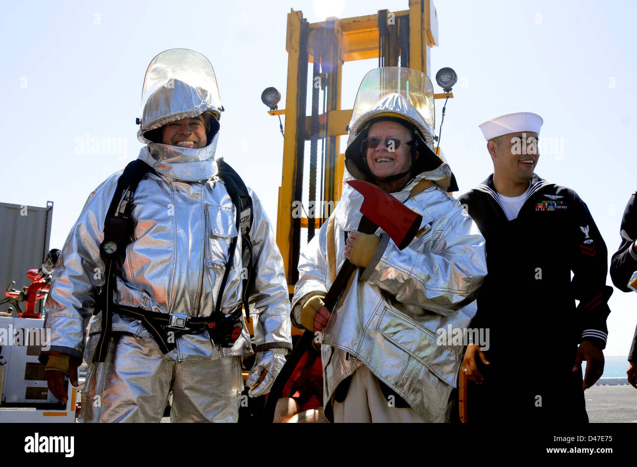 Former President Jimmy Carter wears a proximity suit during a visit to ...