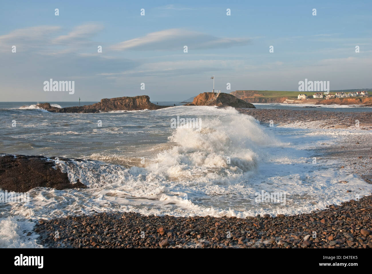 Rough seas at the breakwater with Crooklets Beach in the background at ...