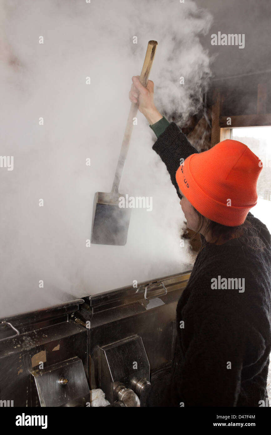 Artisan checking maple syrup density, Woods Cider Mill, Springfield ...