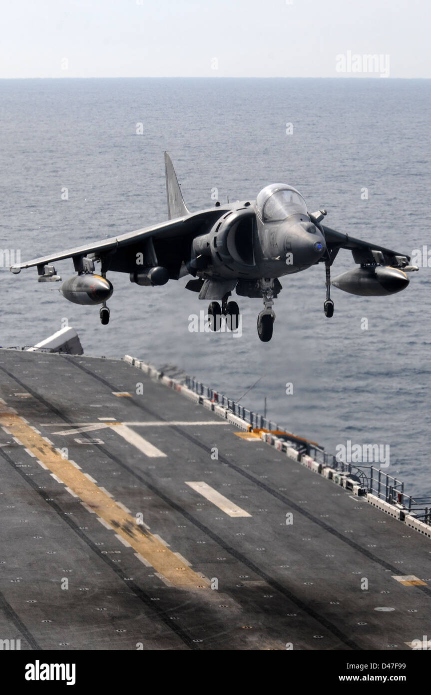 A Harrier jet performs a vertical landing during Bold Alligator 2012 in ...