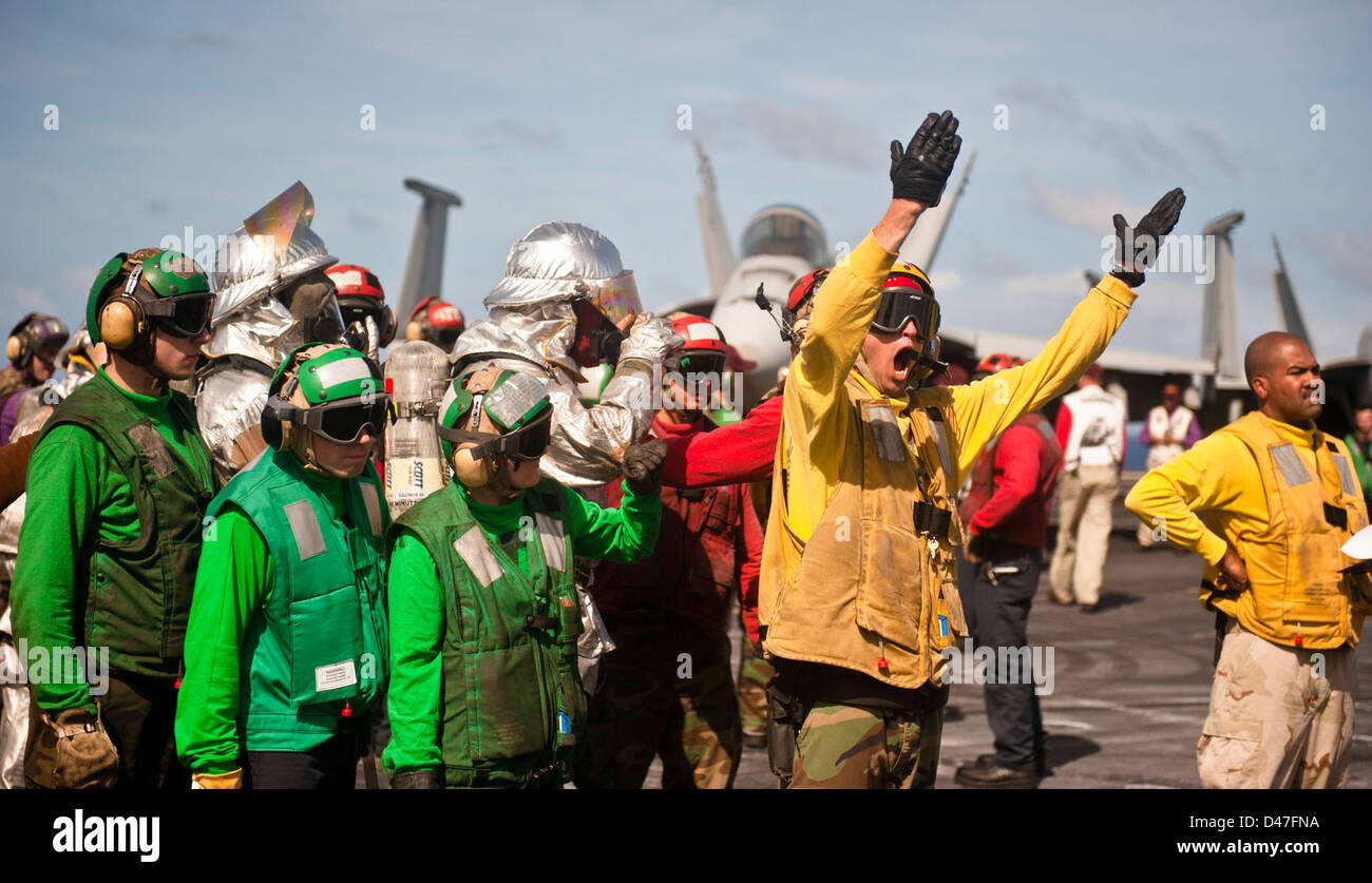 Sailors aboard USS John C. Stennis (CVN 74) conduct a mass casualty ...