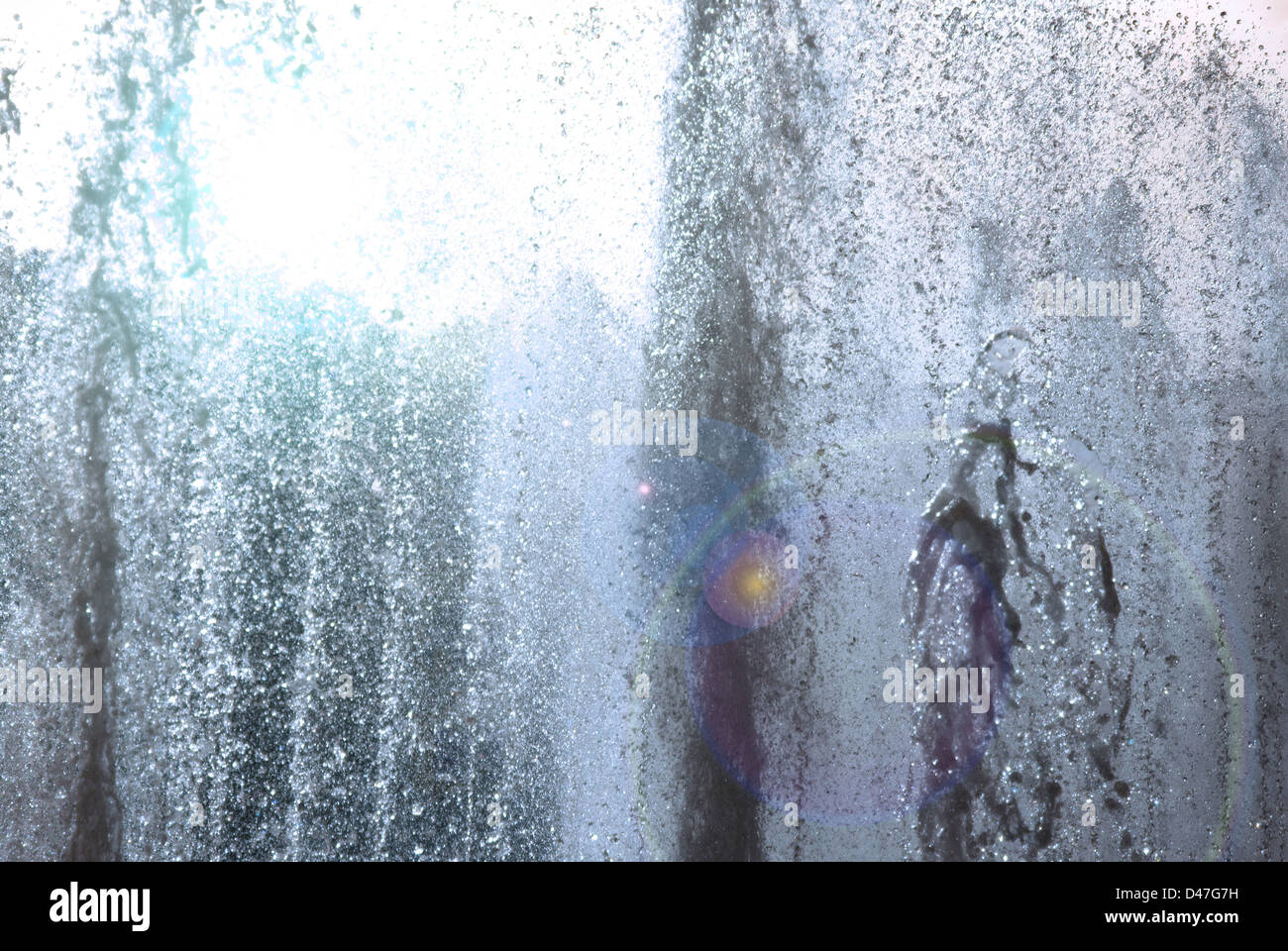 Spray of water from many fountains Stock Photo - Alamy