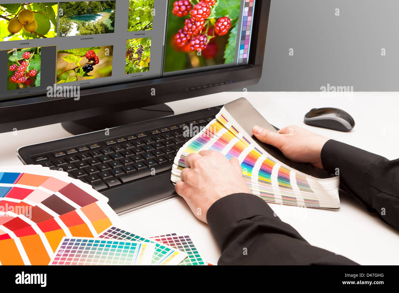 Graphic designer at work. Color samples. Photo picture fruit and nature ...