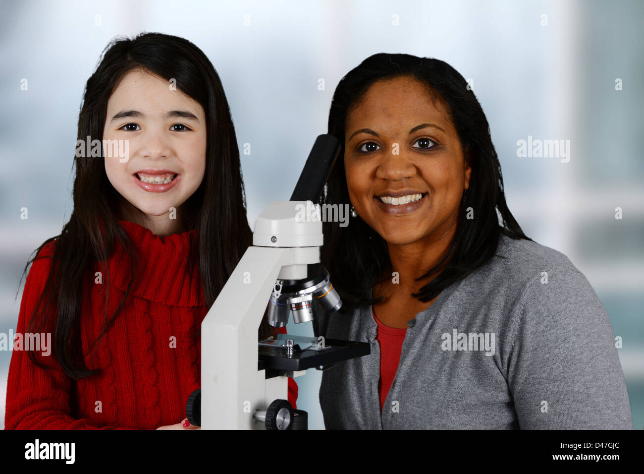 Girl in her classroom at school learning Stock Photo - Alamy