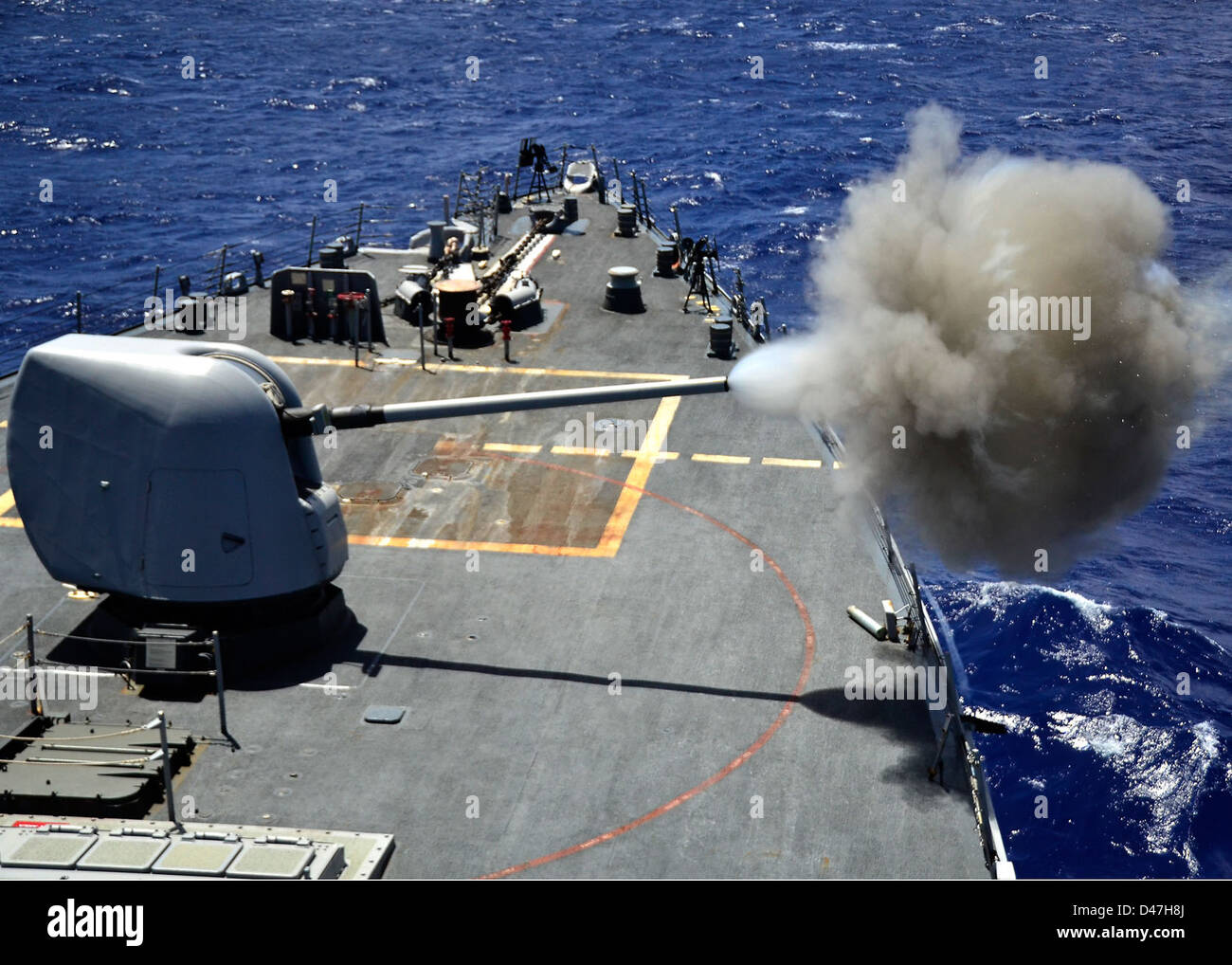 The USS Paul Hamilton (DDG 60), a U.S. Navy destroyer, fires its MK-45 ...