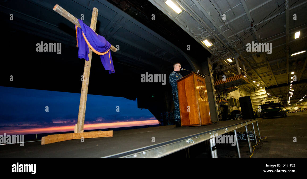 Chaplain Lt. Cmdr. Robert Wills leads the Easter Sunrise Service aboard ...