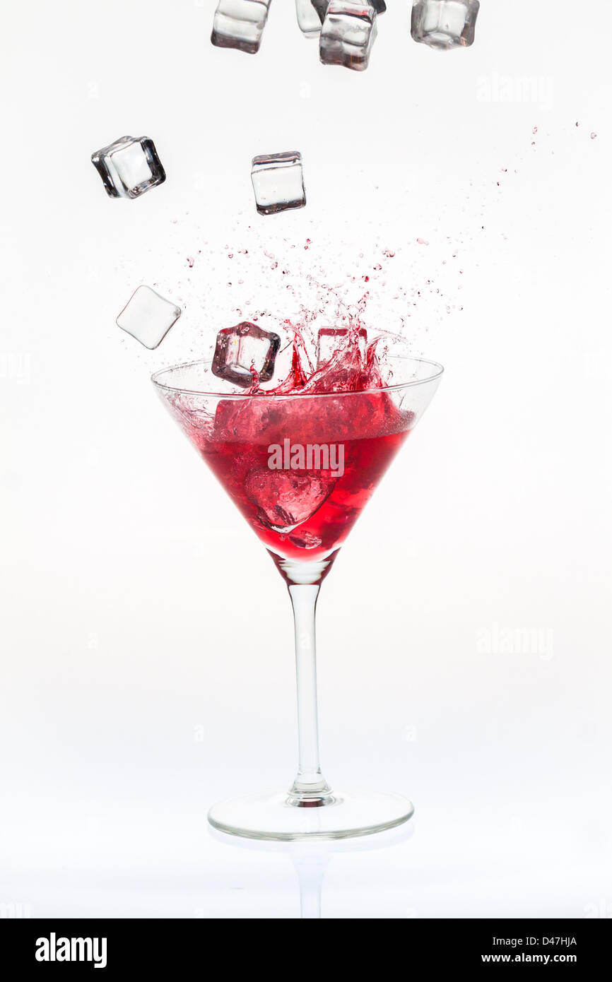 Ice cubes falling into a blended drink Stock Photo - Alamy