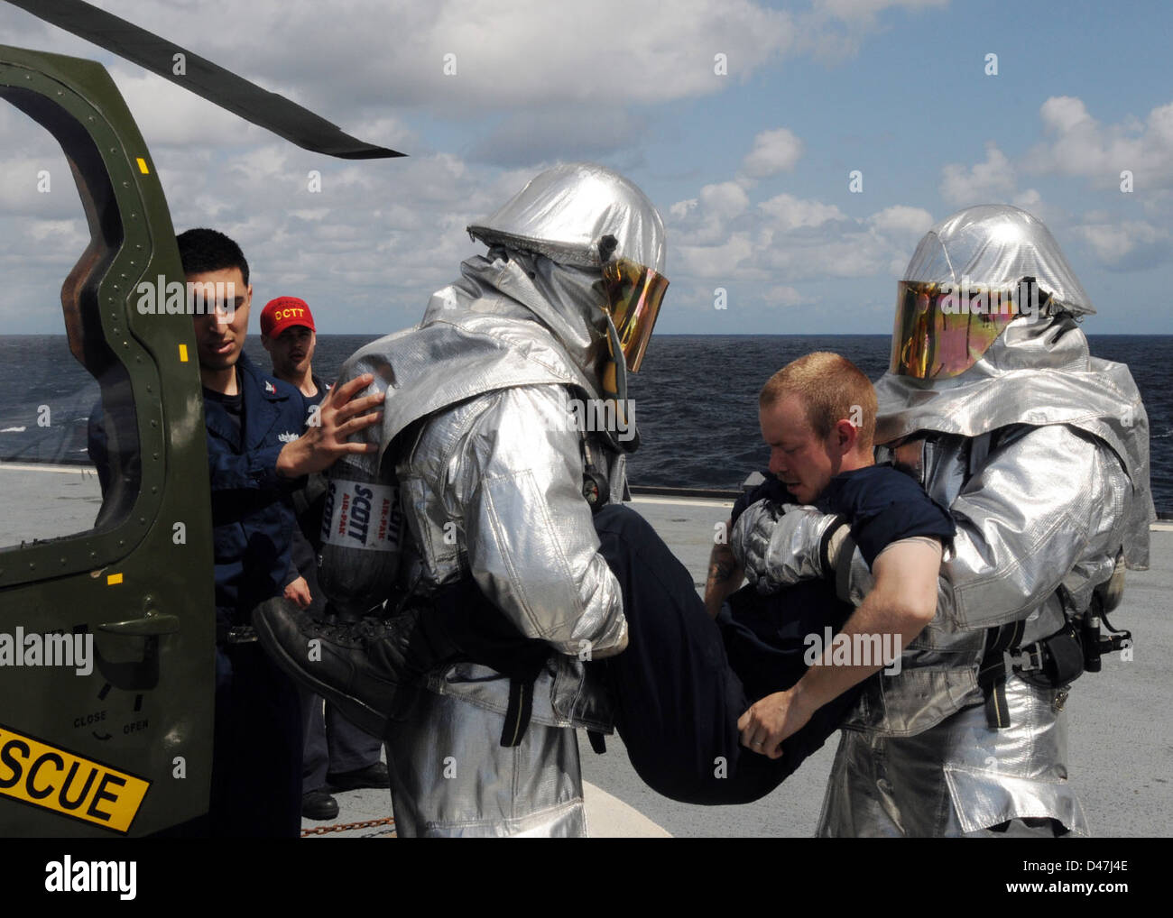 Sailors conduct a firefighting drill Stock Photo - Alamy