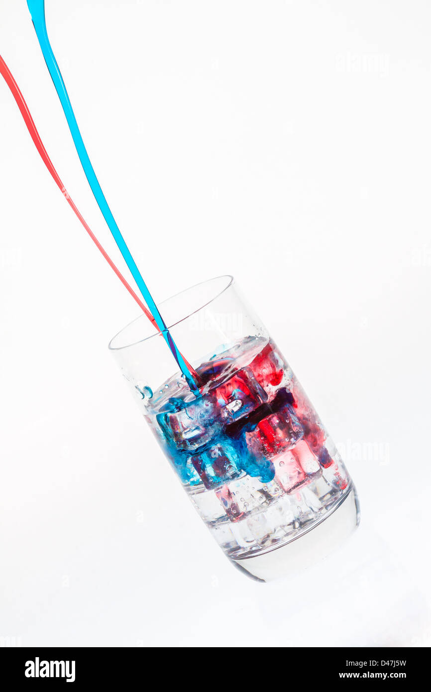 Mixing a colorful drink on ice Stock Photo - Alamy