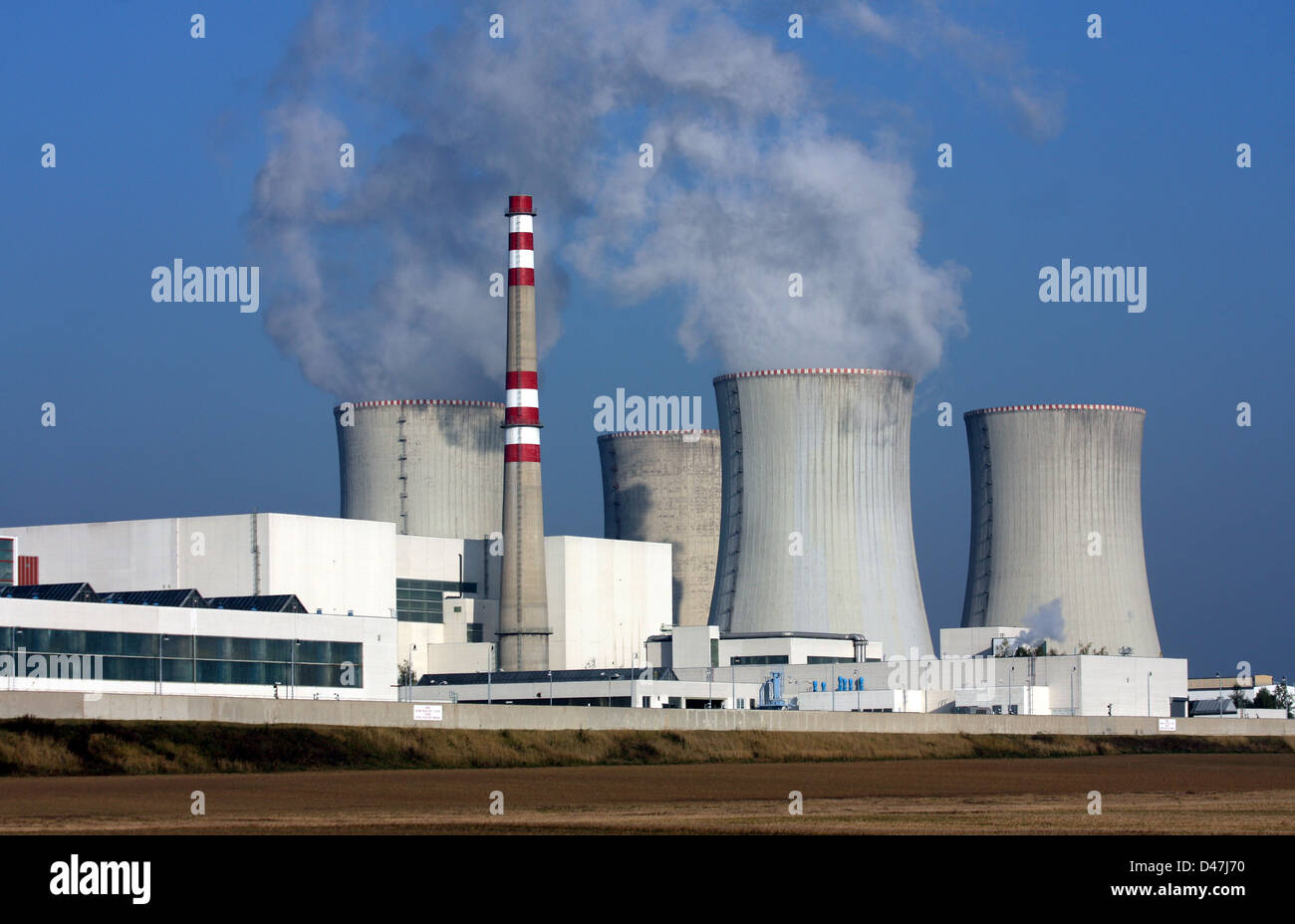 nuclear power plant over the agriculture field Stock Photo - Alamy