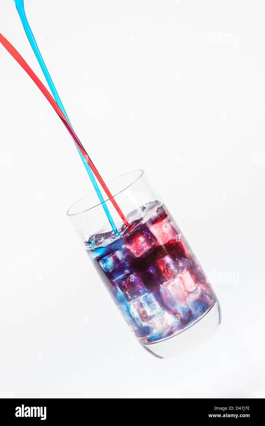 Mixing a colorful cold drink Stock Photo - Alamy