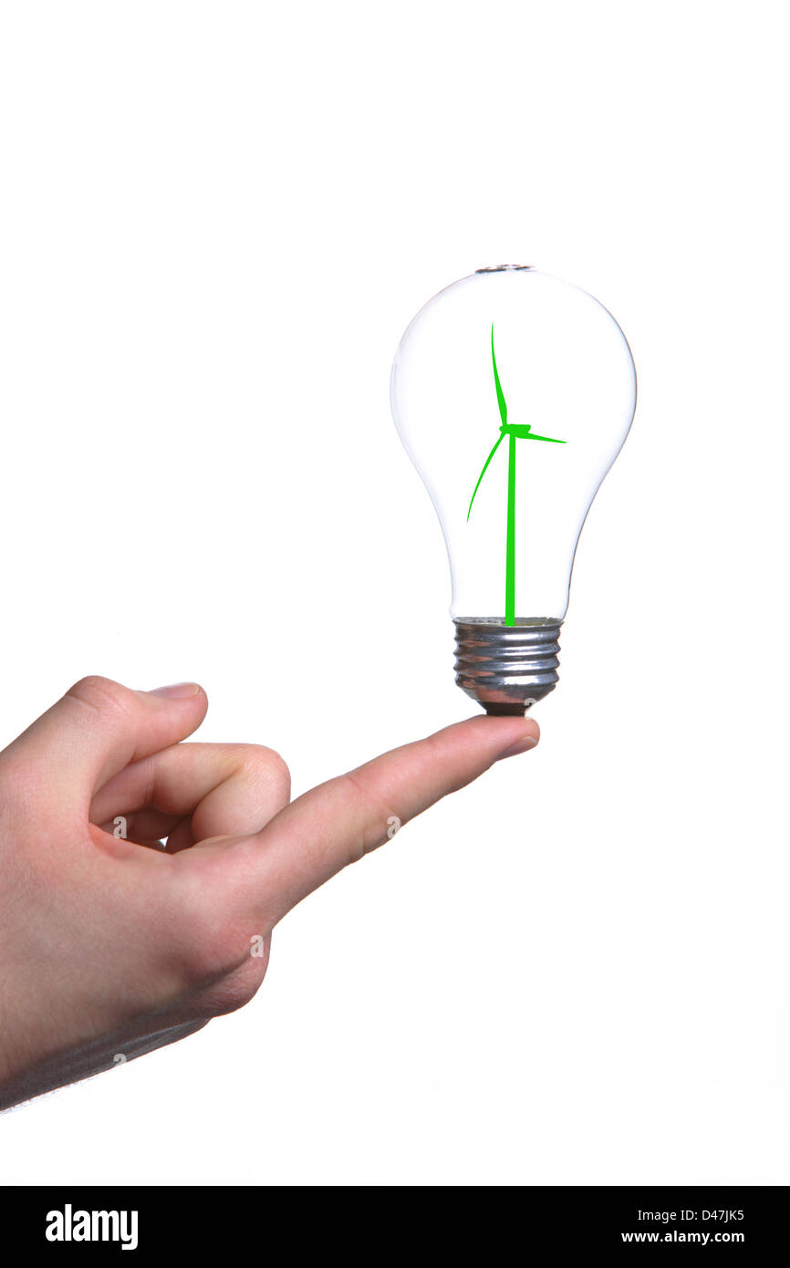 Person holding a modern green light bulb in the studio Stock Photo - Alamy