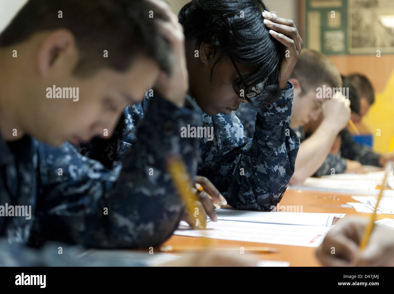 Third class petty officers take an advancement exam Stock Photo - Alamy
