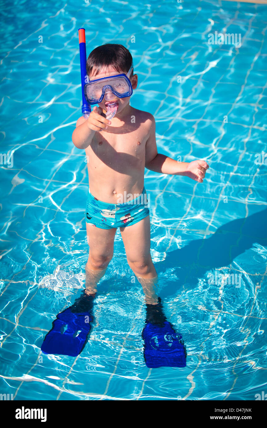 A boy standing in shallow water hi-res stock photography and images - Alamy