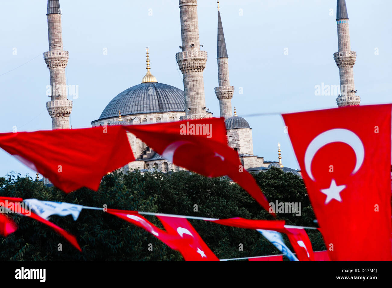 Many turkish flags in front of the Sultan Ahmed or Blue Mosque ...