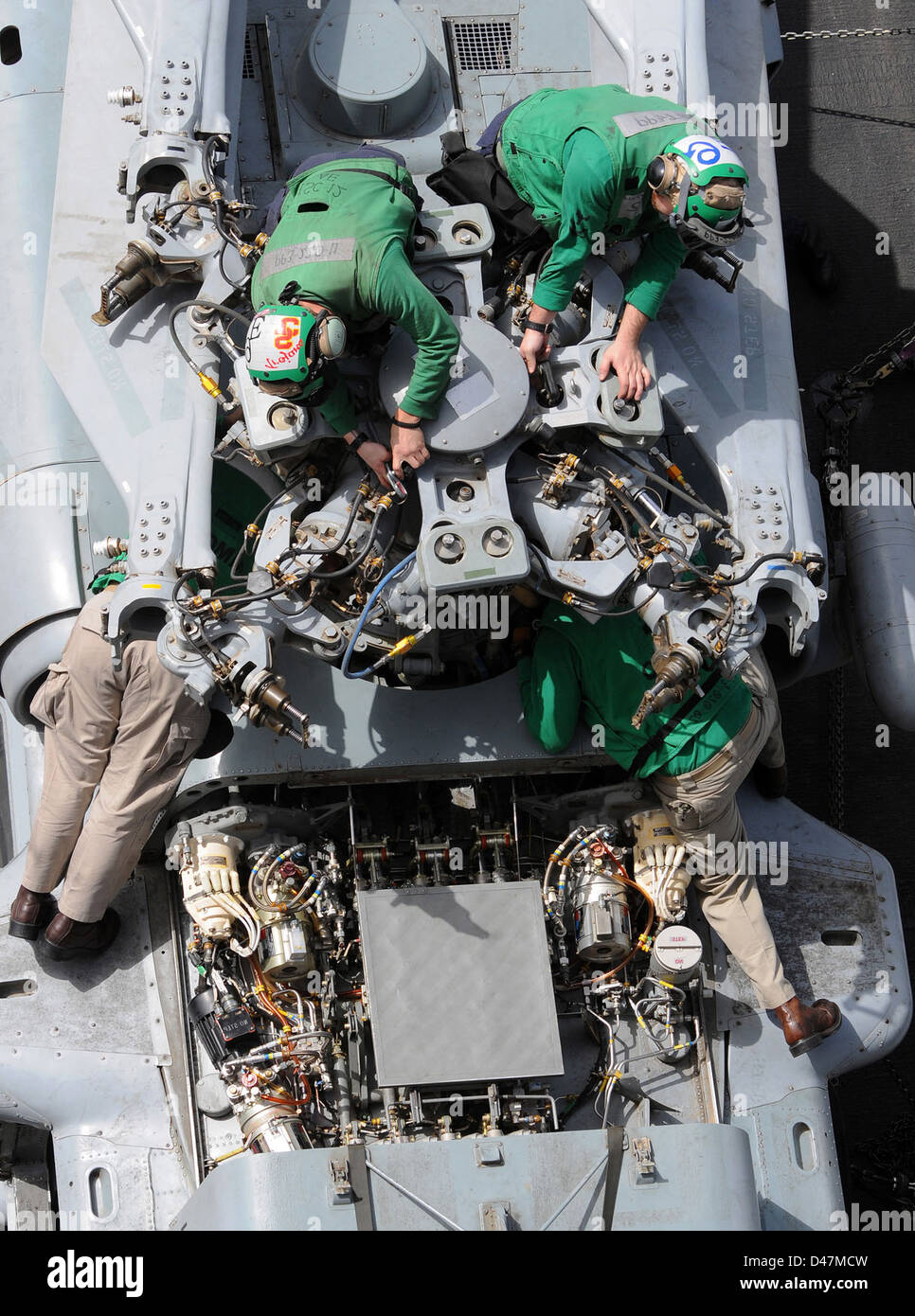 U.S. Navy assets conduct operations in the Strait of Hormuz, a critical ...