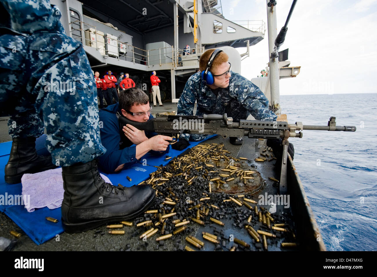 Sailors aboard the USS Dwight D. Eisenhower (CVN 69) conduct a live ...