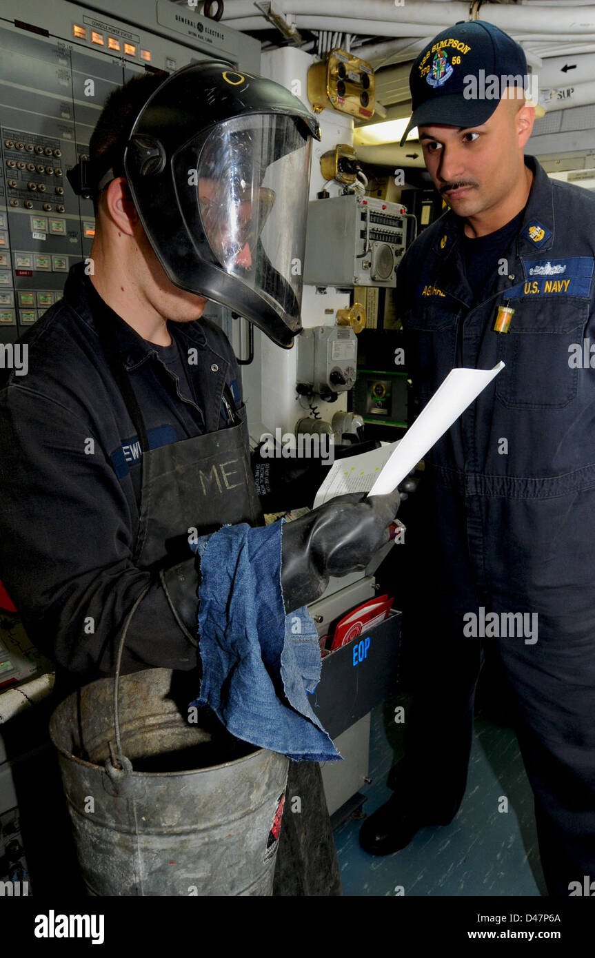 U.S. Navy sailors conduct preventative maintenance on ship systems to ...
