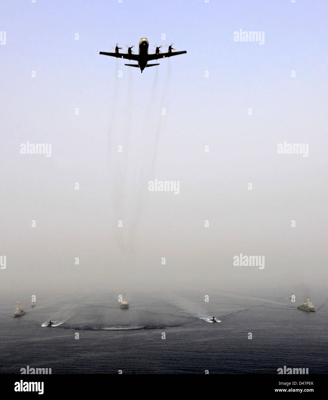 Naval ships from partner nations come together in formation in the ...