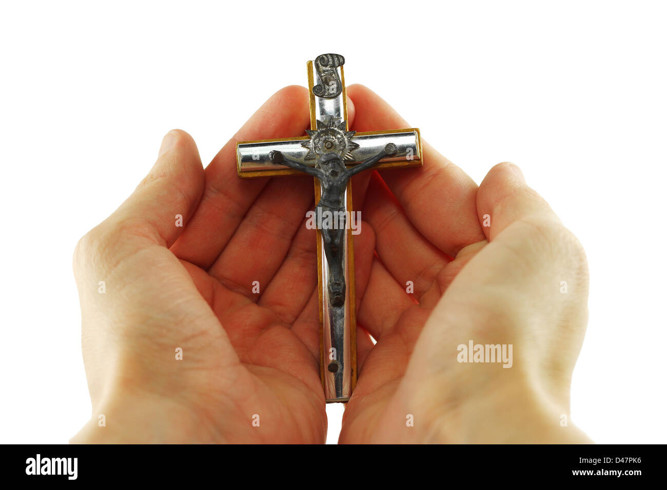 Hands holding crucifix on white background Stock Photo - Alamy