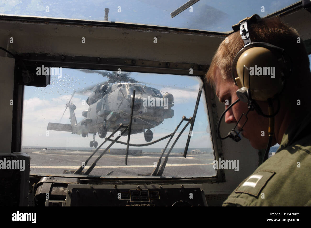 Officer oversees flight operations hi-res stock photography and images ...