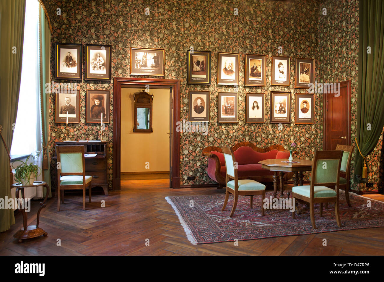 Room With Framed Portraits Stock Photo - Alamy