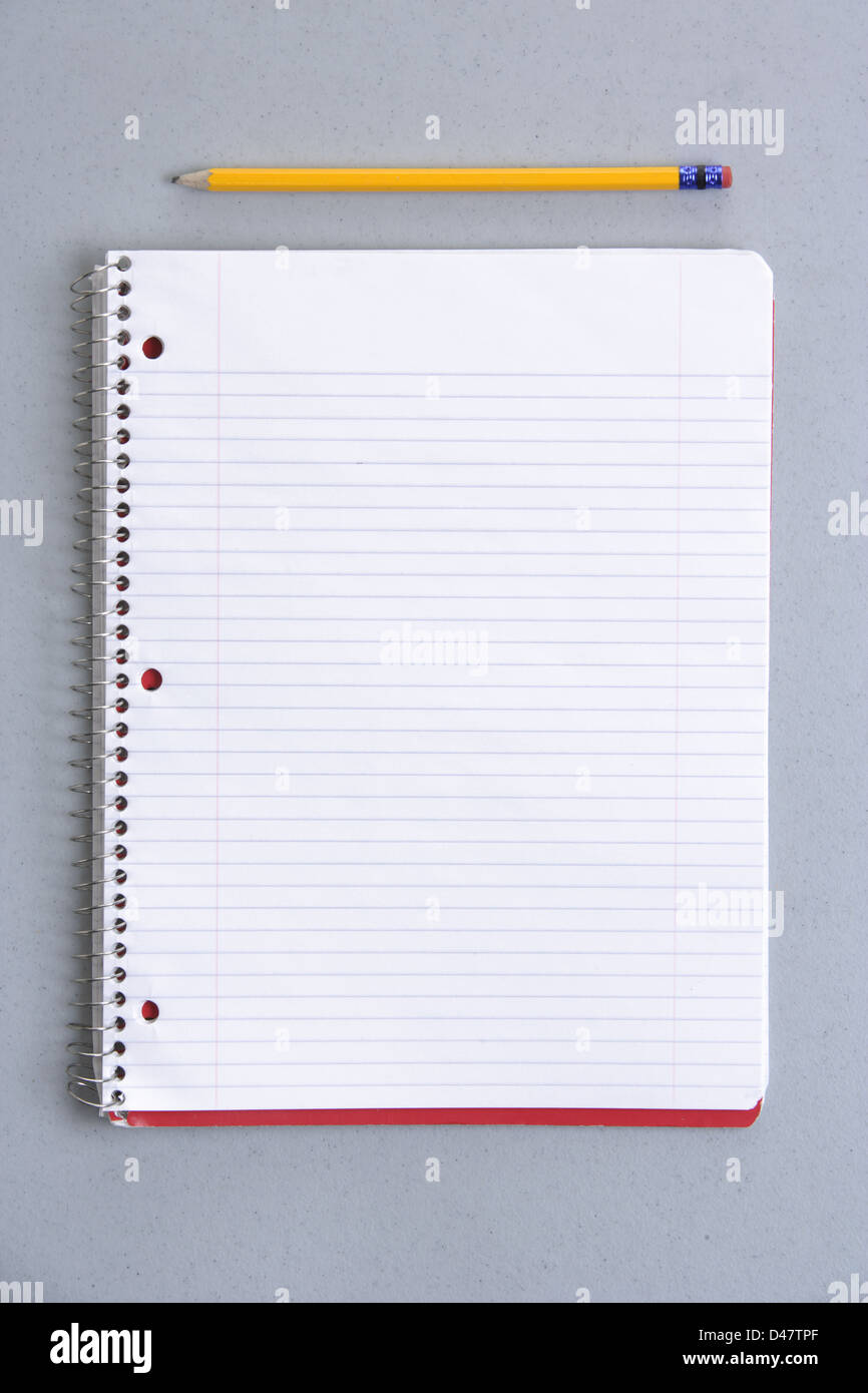 Blank notebook on desk at school or office Stock Photo - Alamy