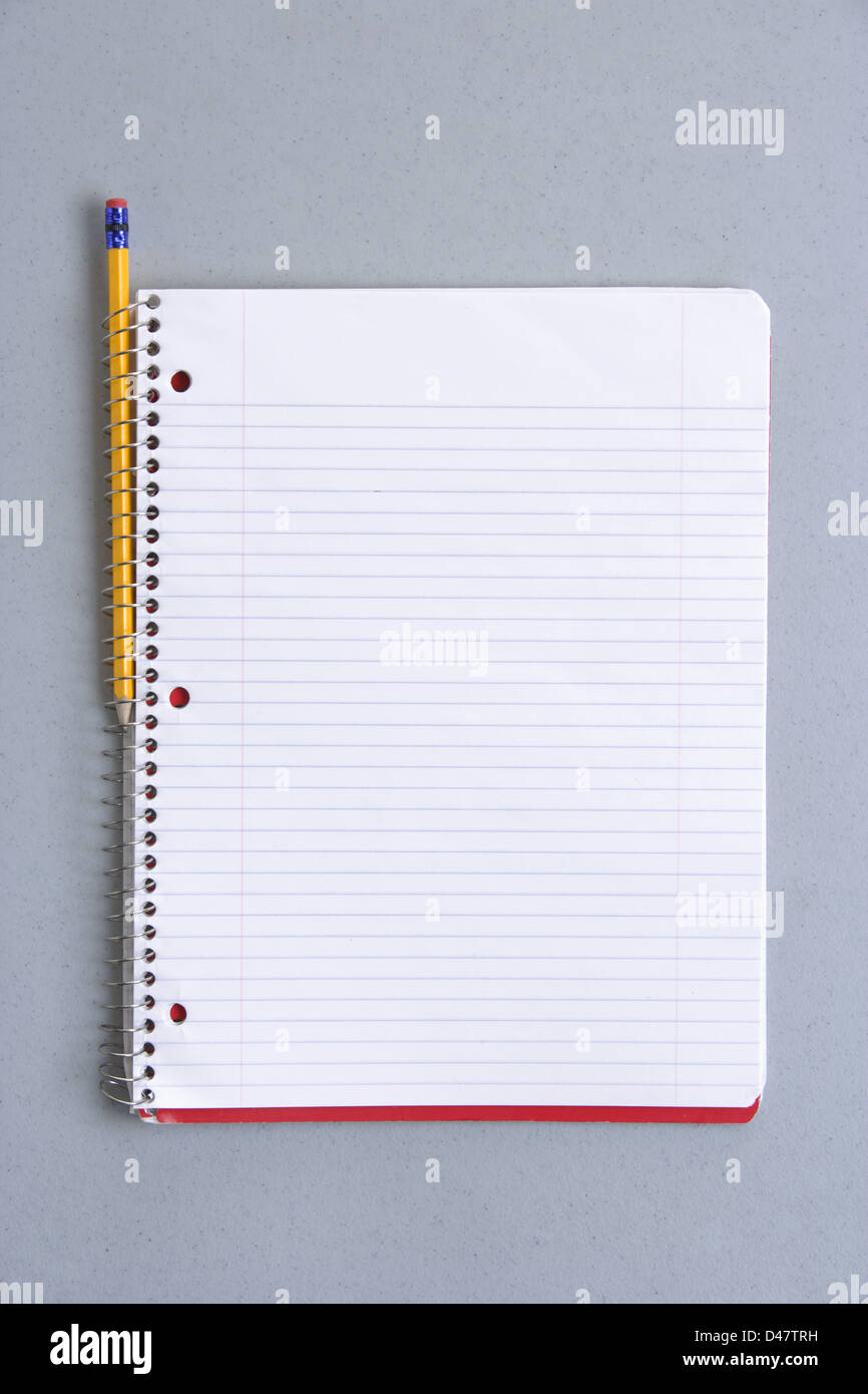 Blank notebook on desk at school or office Stock Photo - Alamy