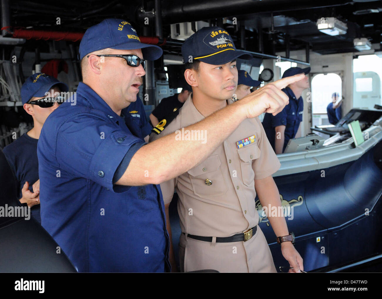 U.S. and Royal Thai Navy officers discuss ship speed and distance ...