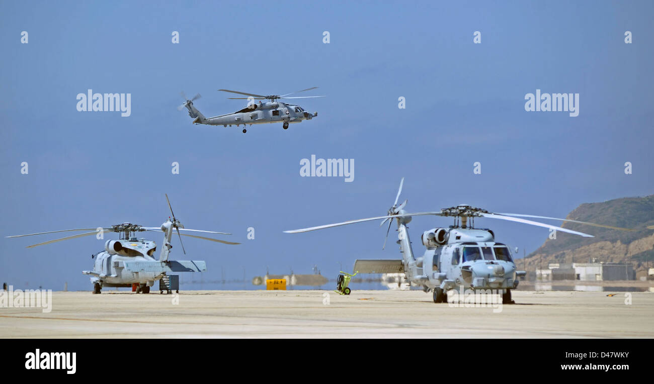 A helicopter lifts off from the flight line Stock Photo - Alamy