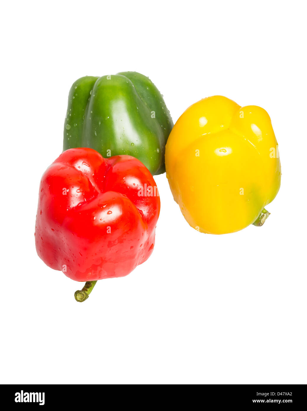 Three colorful bell peppers isolated on white Stock Photo - Alamy