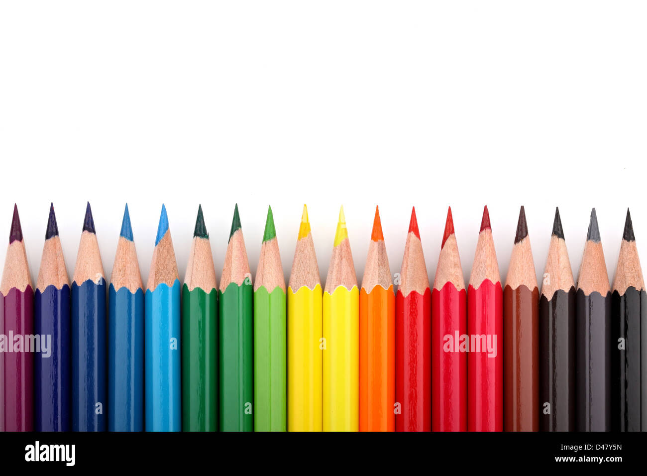 Differnt colored pencils in a formation Stock Photo - Alamy