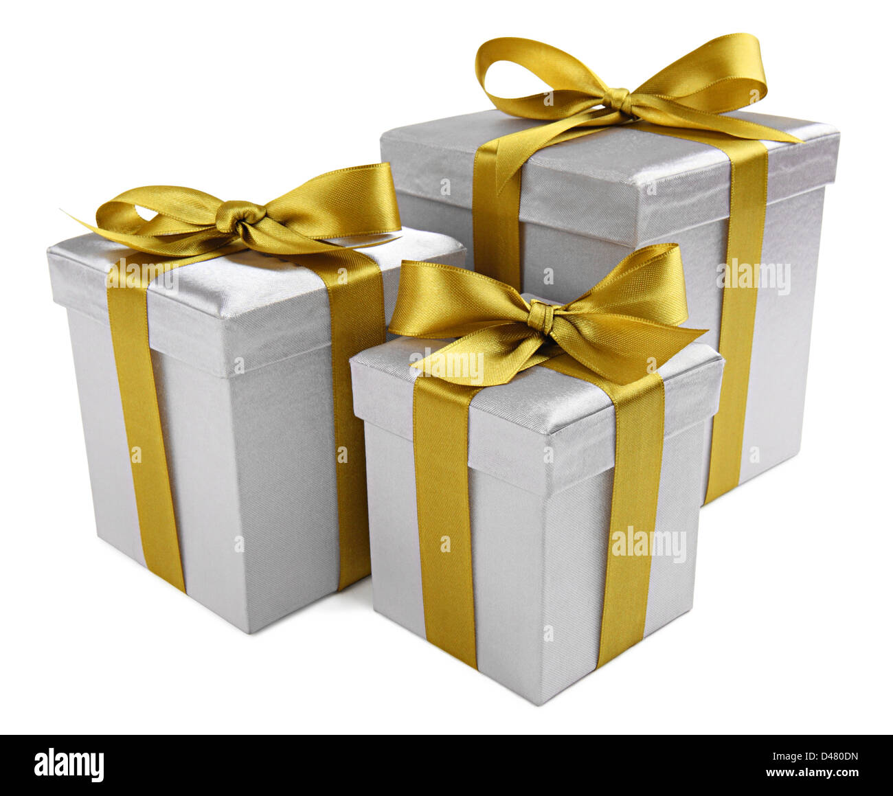 group of silver presents with a golden ribbon on white background Stock ...