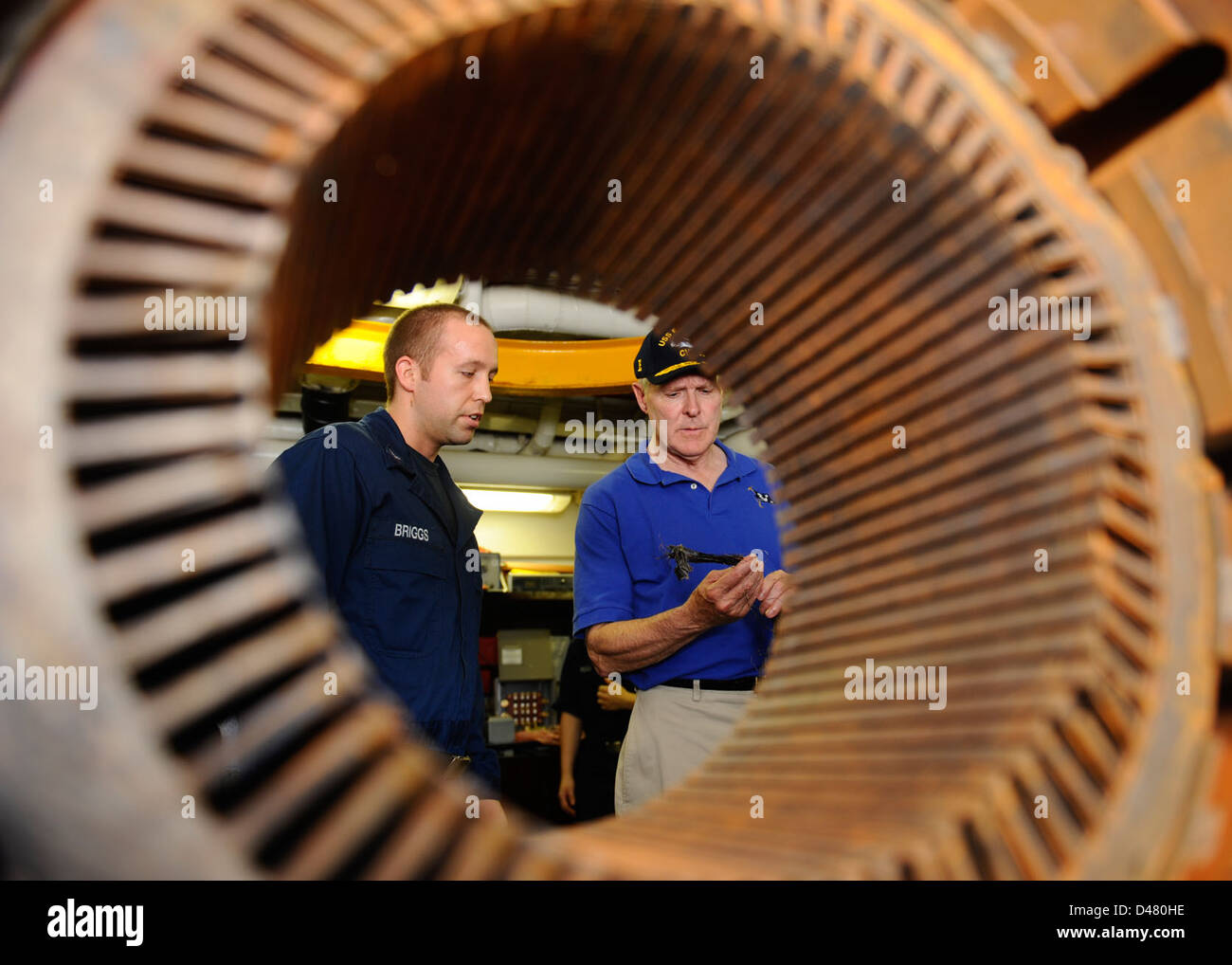 The Secretary of the Navy (SECNAV) meets with a Sailor aboard a U.S ...