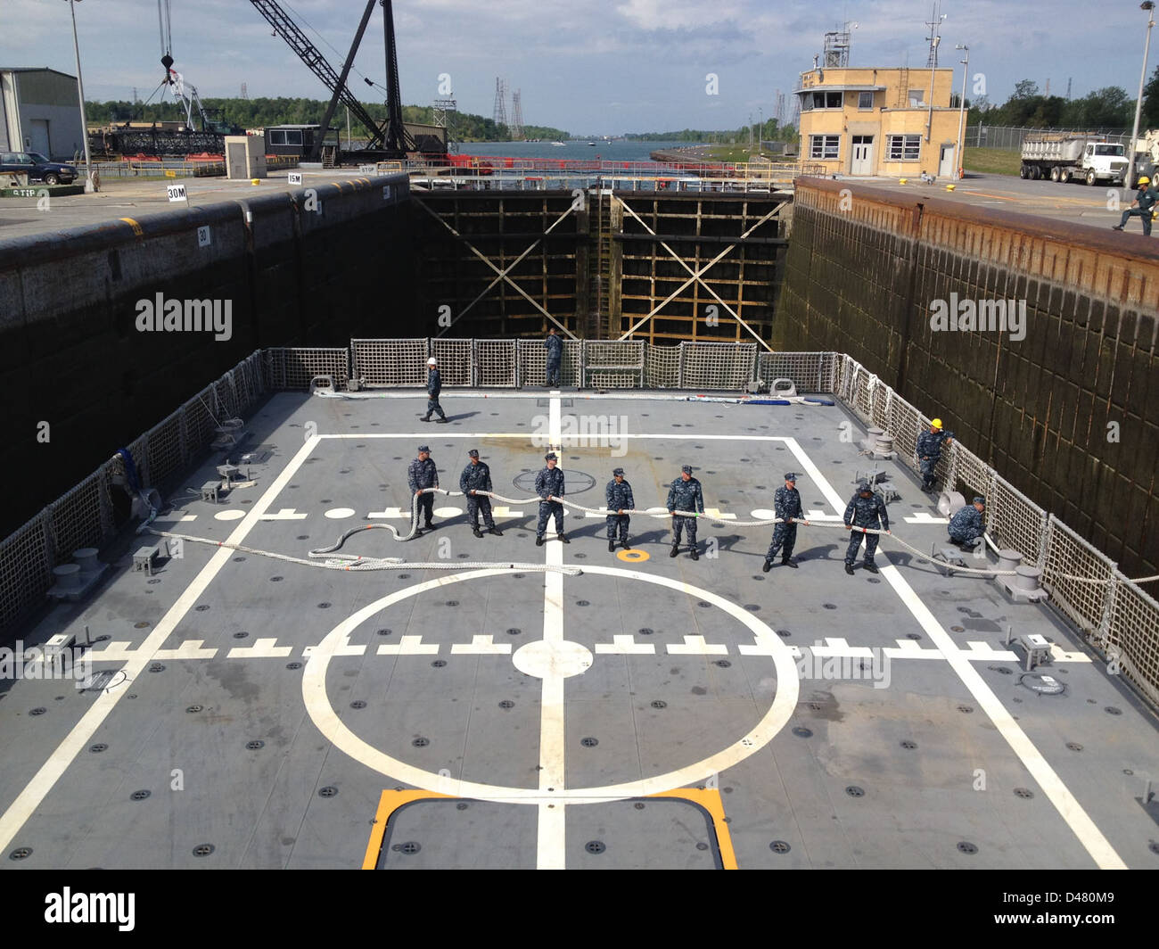 USS Fort Worth navigates through the St. Lawrence Seaway lock system ...
