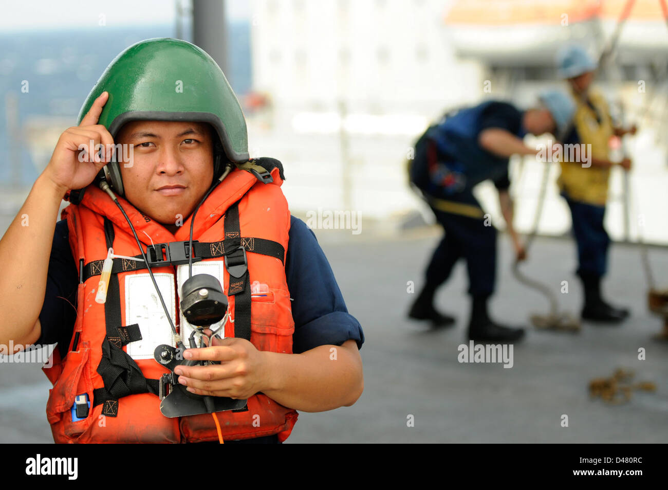 U s navy sailor operates hi-res stock photography and images - Alamy