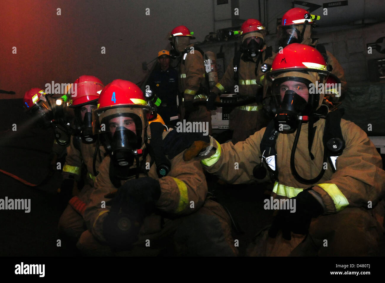 Sailors practice in fire fighting Stock Photo - Alamy