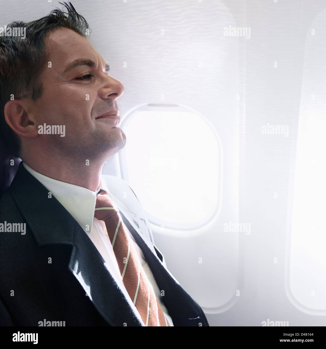 Smiling face airplane hi-res stock photography and images - Alamy