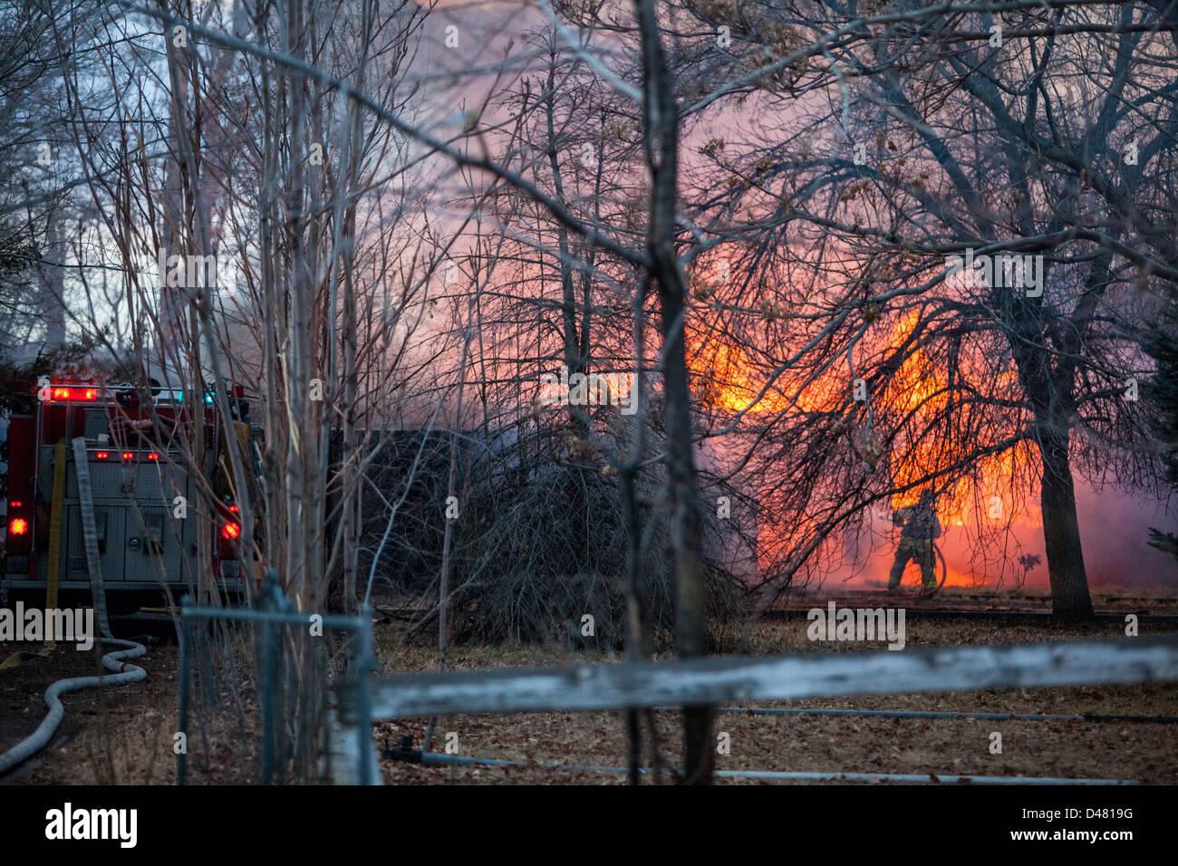 Firefighters battle a house fire in the town of Fernley Nevada Stock ...