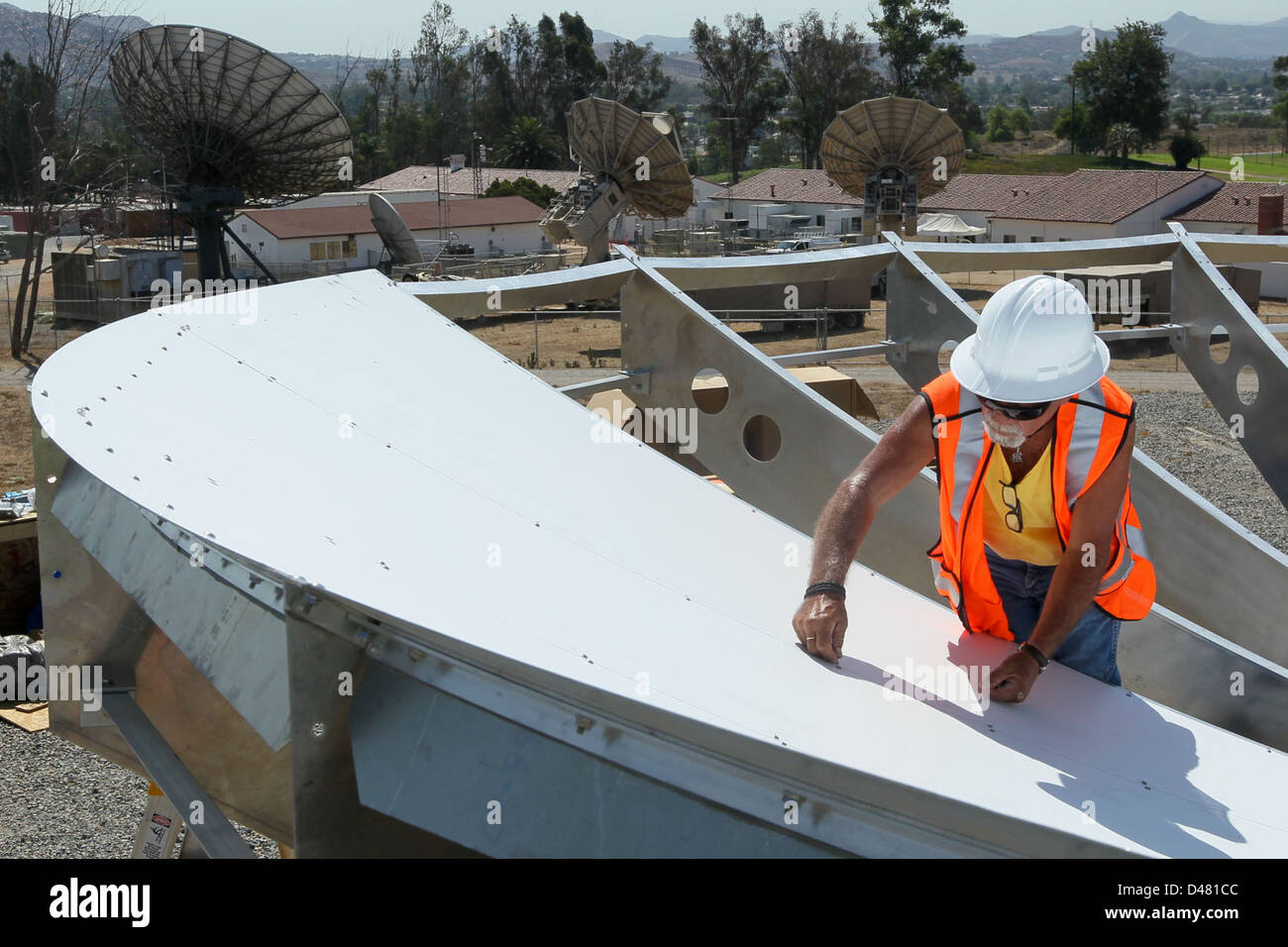 Workers at the Naval Surface Warfare Center (NSWC) Corona Division in ...