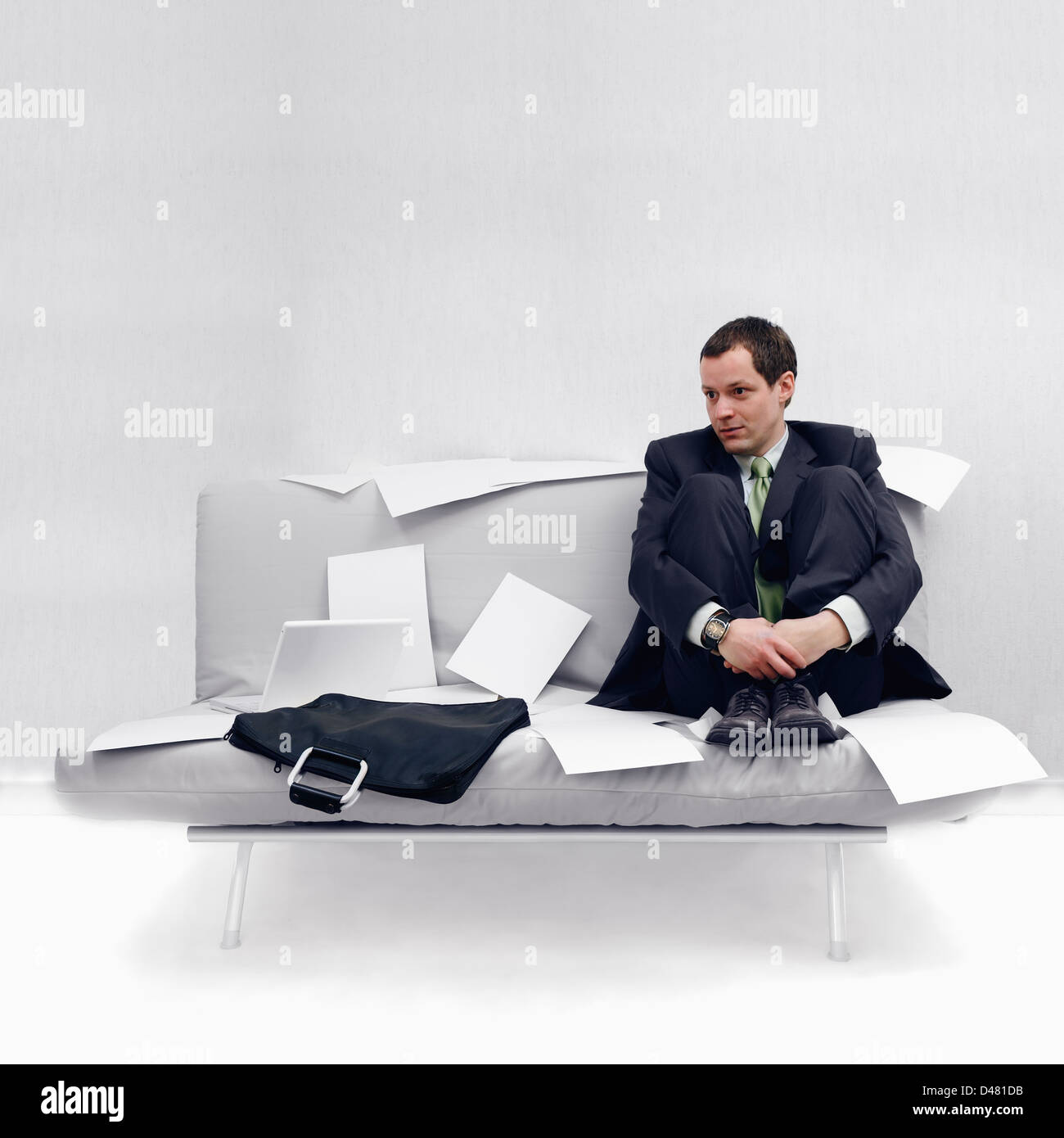 A businessman overwhelmed with business problems Stock Photo - Alamy