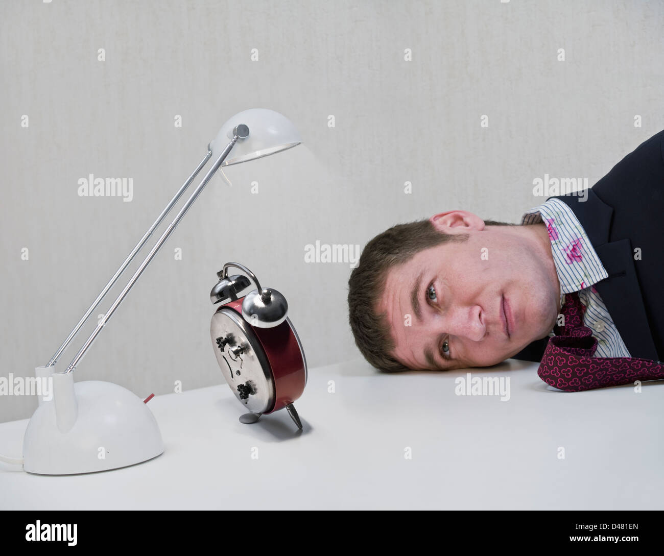 a slow day at work/business. a businessman has nothing else to do but ...