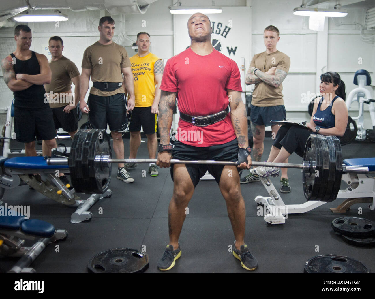 A U.S. Navy Sailor demonstrates strength by deadlifting 400 pounds ...