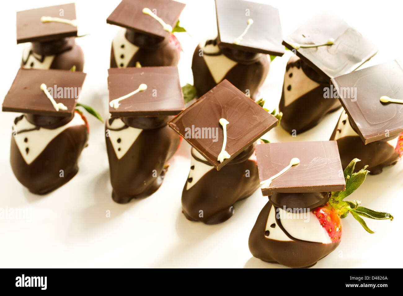 Gourmet chocolate covered strawberries decorated for graduation party ...