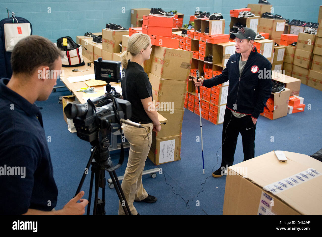 A member of the U.S. Paralympic swim team gives an interview about ...