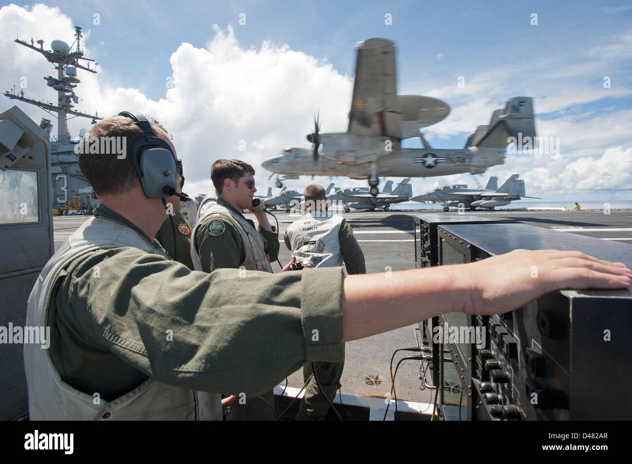 USS George Washington conducts flight operations, performing various ...