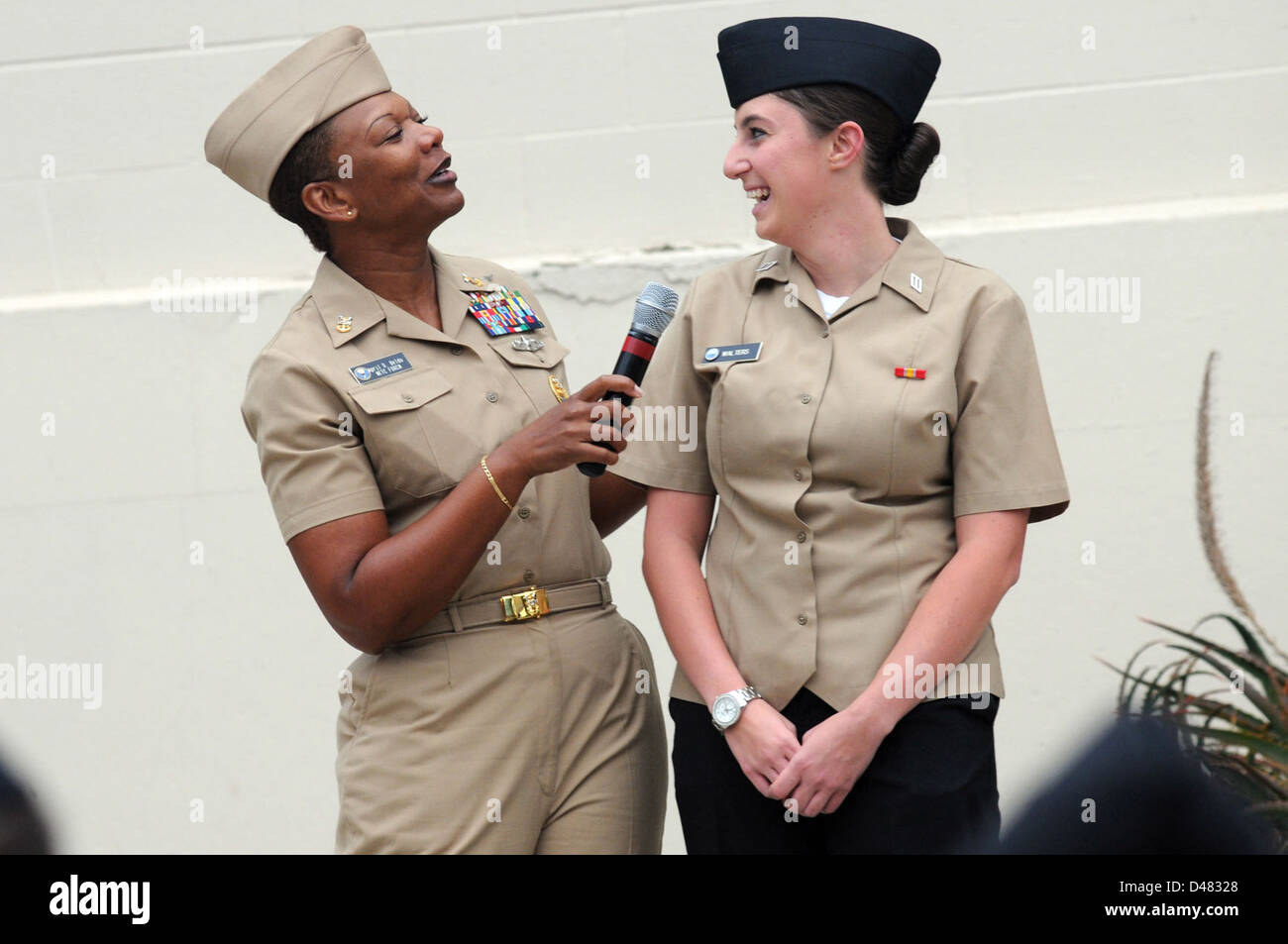 A Master Chief thanks a Sailor Stock Photo - Alamy